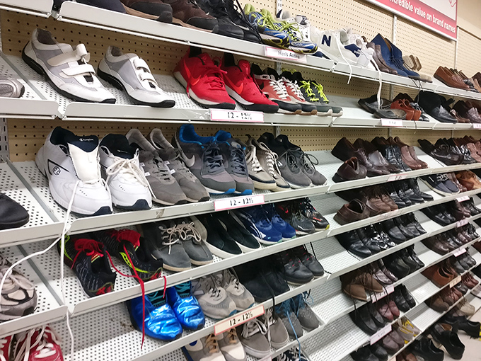 The shoe section – a footwear buffet where barely-worn sneakers and vintage boots line up for their second dance.