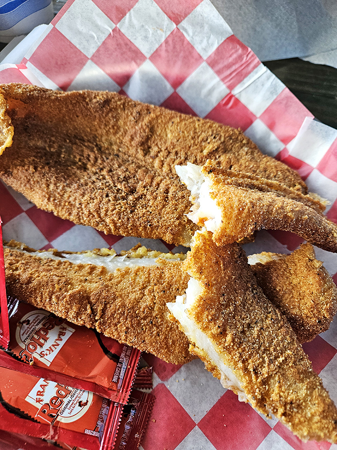 Cornmeal-crusted catfish with the perfect crunch-to-tenderness ratio. Like the seafood equivalent of finding the perfect pair of jeans&mdash;satisfying in ways words can't describe. 