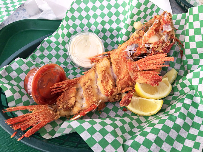 Deep-fried whole fish that would make your pescatarian friends weep with joy. Crispy exterior, tender interior, and absolutely worth getting your hands dirty.