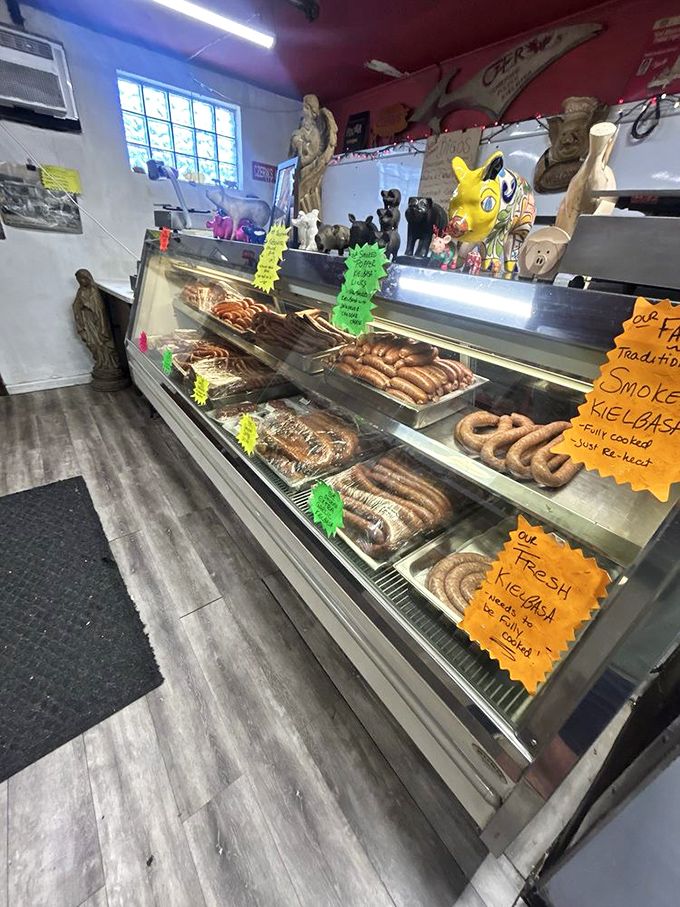 Behind the glass lies a wonderland of smoked treasures, each link and loop a testament to old-world techniques that refuse to be rushed.