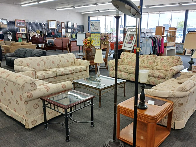 Living room vignettes that look like they're auditioning for a cozy sitcom set. That floral couch has "Sunday afternoon nap" written all over it.