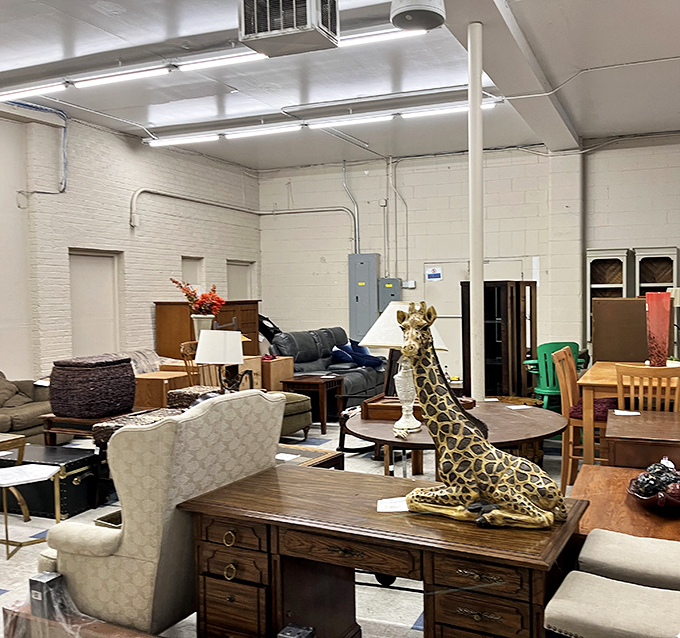 Furniture that's seen more family dinners than most therapists &ndash; plus a giraffe statue that's clearly the room's conversation starter.
