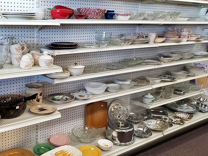 Dishware department where mismatched becomes charming and vintage becomes valuable. Grandmother's china pattern might be hiding on these very shelves.