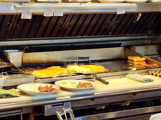 The griddle where magic happens – think Excalibur, but for spatulas and burger flipping.