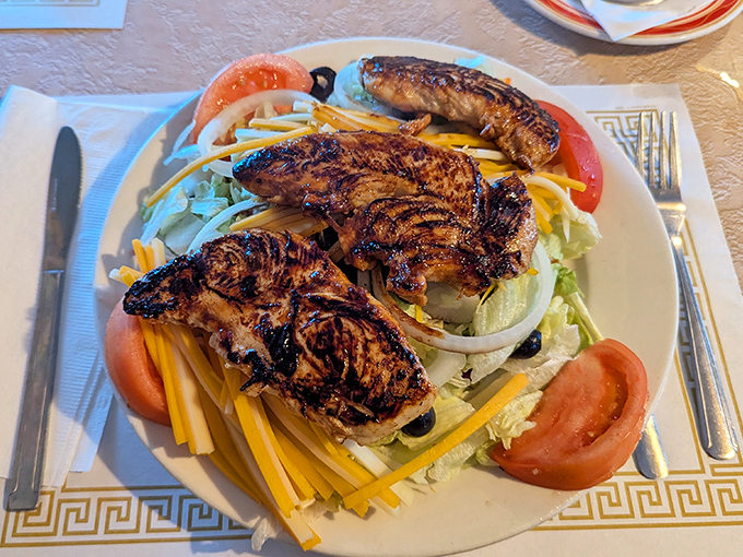 This grilled chicken salad isn't just healthy eating&mdash;it's a colorful celebration that proves Fred's does "light" options with the same dedication as their heartier fare.