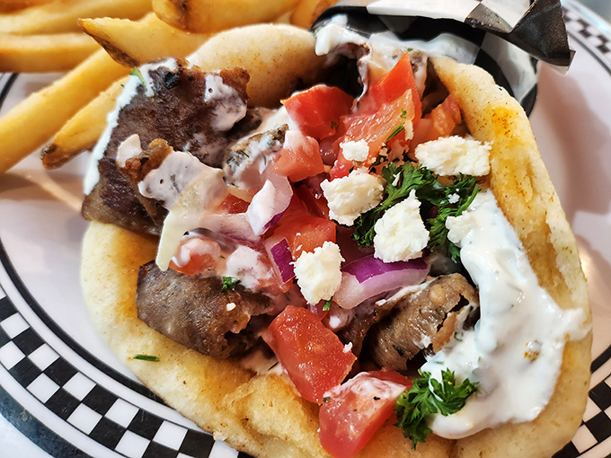 This gyro doesn't just satisfy hunger&mdash;it resolves it completely. Tzatziki cascading over perfectly seasoned meat in a handheld flavor festival.
