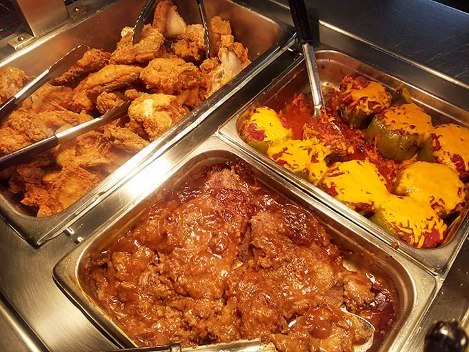 The hot food trifecta: fried chicken, mystery meat in sauce, and stuffed peppers. The buffet equivalent of hitting the culinary jackpot.
