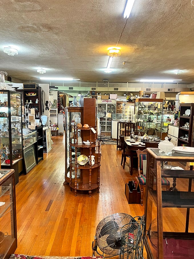 The wide-open layout invites wandering and wondering. Each glass case contains miniature museums curated by dealers who know their treasures' stories.