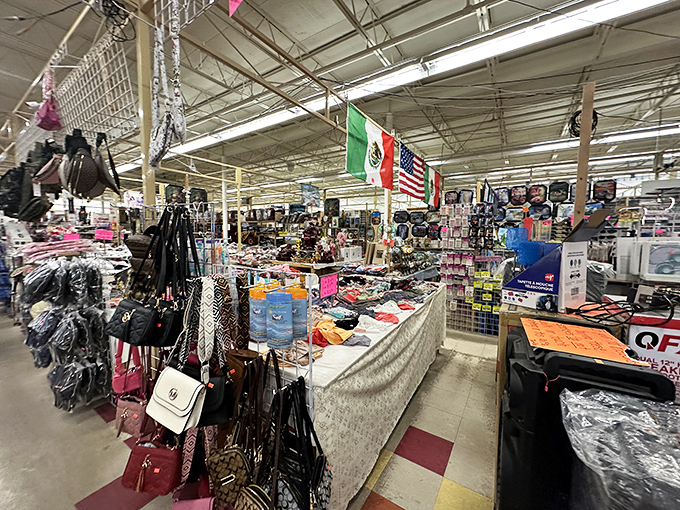 A marketplace mosaic where Mexican and American flags fly side by side, united in the universal language of bargains.