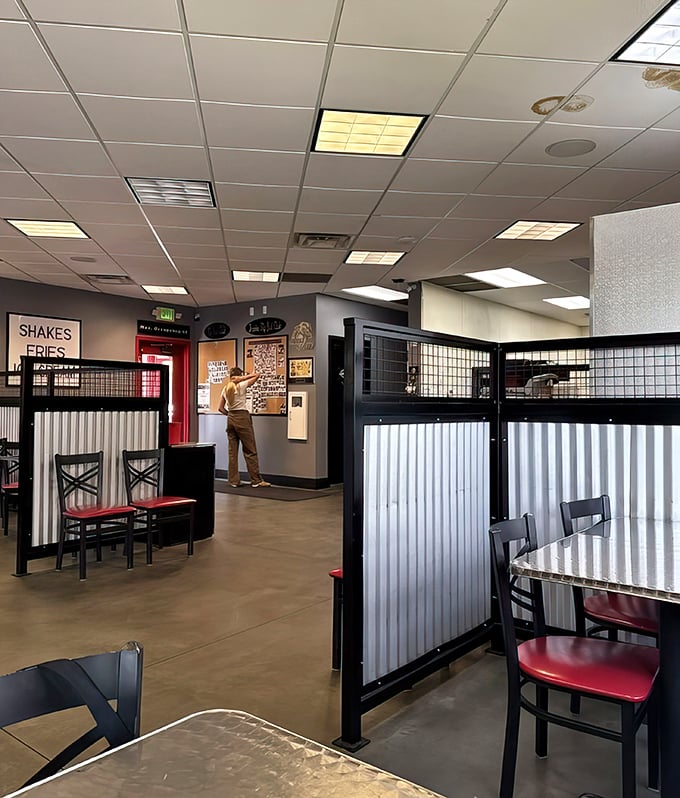 The corrugated metal dividers create burger booths that feel like private dining chambers for your personal rendezvous with beef.