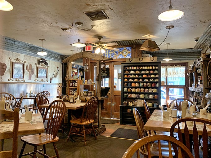 Vintage decor meets functional dining space with stained glass accents overhead&mdash;proving that sometimes the best restaurants are time machines disguised as cafes.