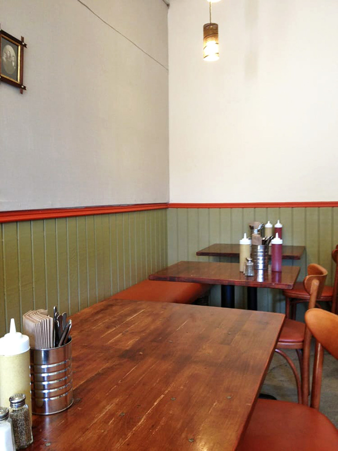 Simple wooden tables and chairs invite conversation and lingering. No pretension here&mdash;just good food and the warm glow of community.