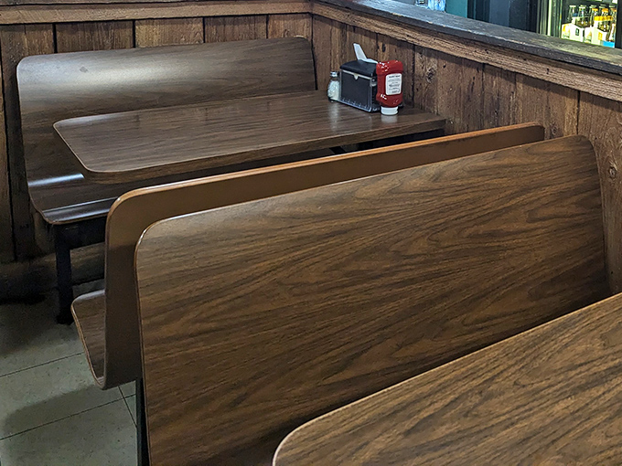 Old-school wooden booths that have cradled countless conversations, celebrations, and "we need to talk" moments over the decades.