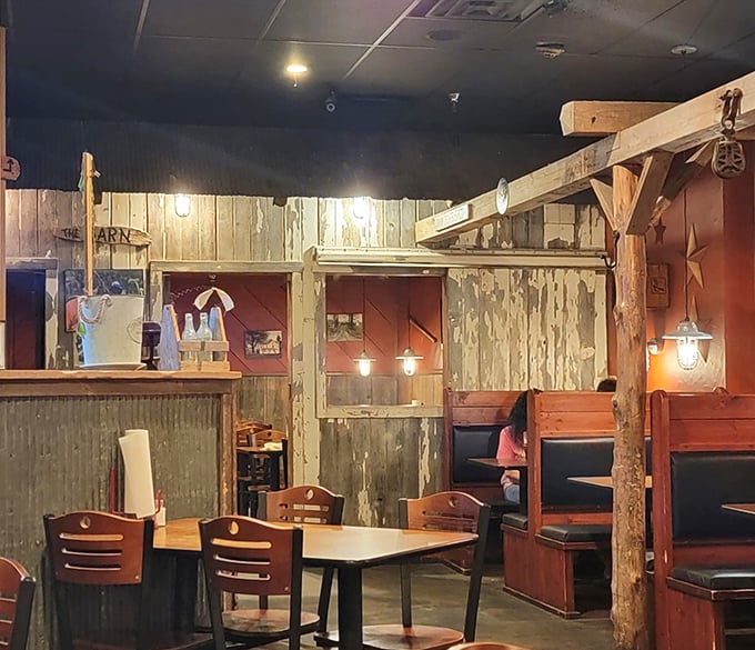 Another angle reveals more of the thoughtful barn-inspired design. Where every wooden beam and pendant light tells the story of American barbecue tradition.