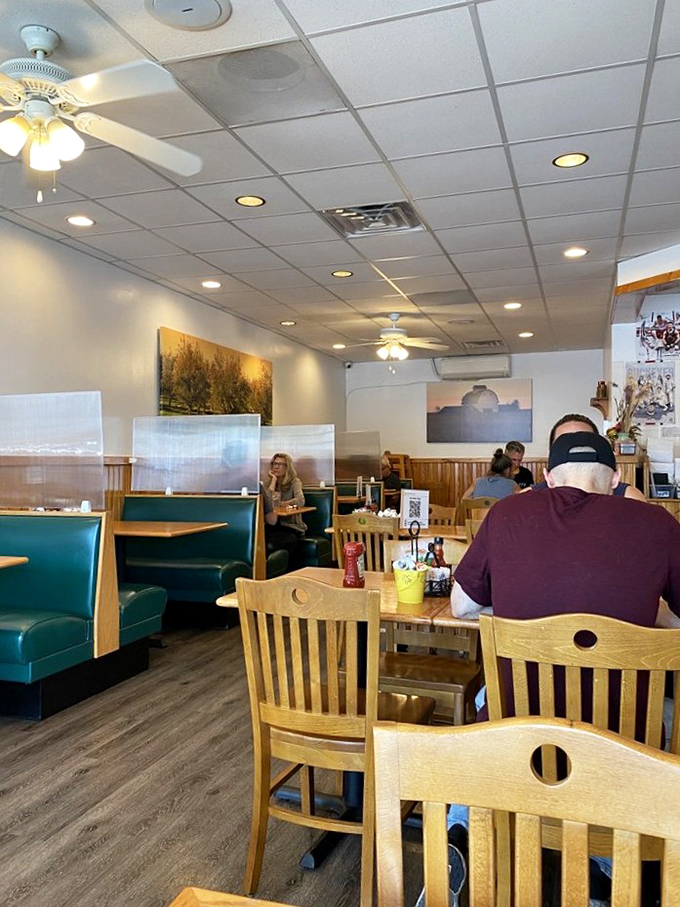 More cozy booths and artwork that adds character without trying too hard, because Grand Day knows what really matters here.