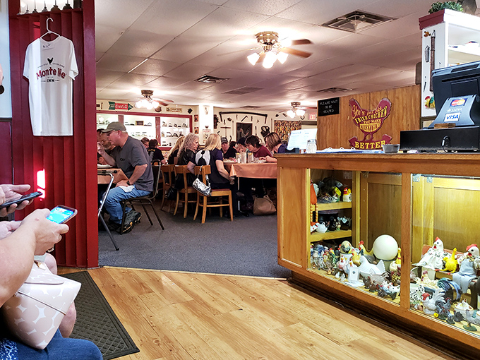 Beyond the dining area, a collection of chicken-themed memorabilia reminds you that you're in a place that takes its poultry seriously.