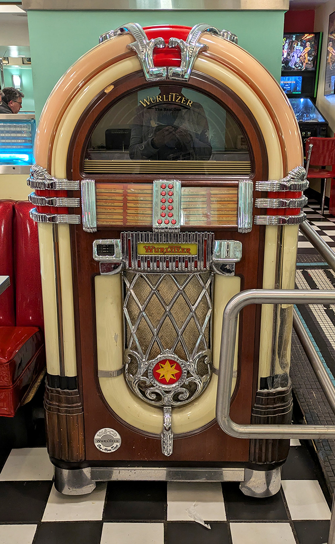 The Wurlitzer jukebox stands like a musical time machine, ready to transport you back to simpler times with the press of a button.