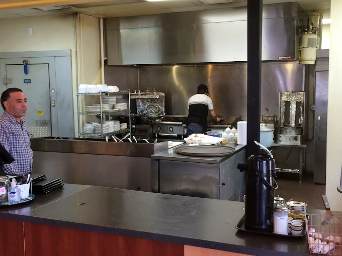 The open kitchen where the magic happens, giving you a front-row seat to watch your shawarma come to life.