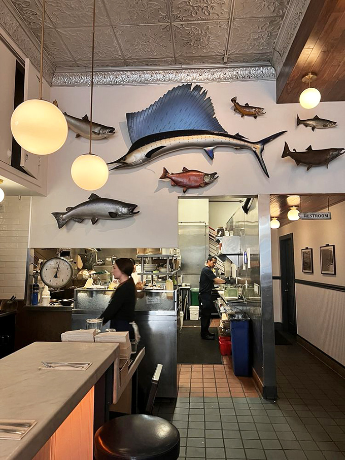 Where the magic happens. Those fish mounted on the wall aren't just decoration&mdash;they're the inspiration for what's coming out of that kitchen.