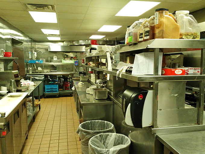 Behind the scenes – the kitchen's organized chaos reveals where those perfect eggs and crispy home fries are born. Respect the process!