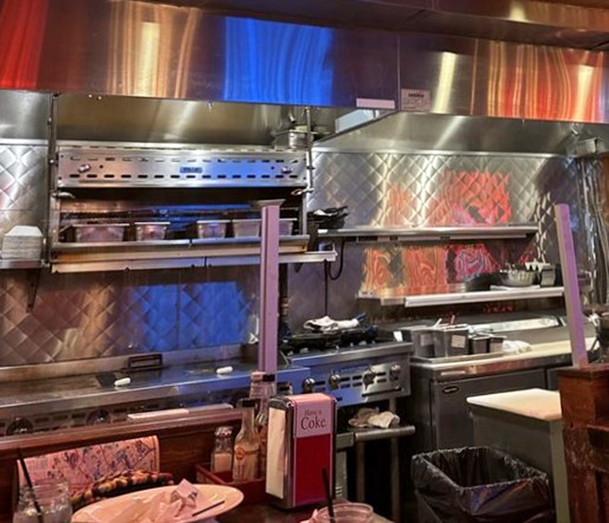 The kitchen in full view where all the magic happens, nothing hidden, just pure breakfast artistry.