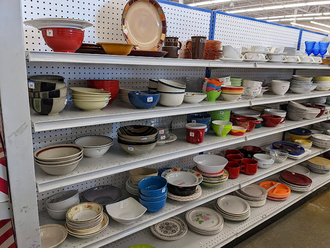 Kitchenware heaven—where mismatched dishes become "curated collections" and vintage Pyrex causes heart palpitations.