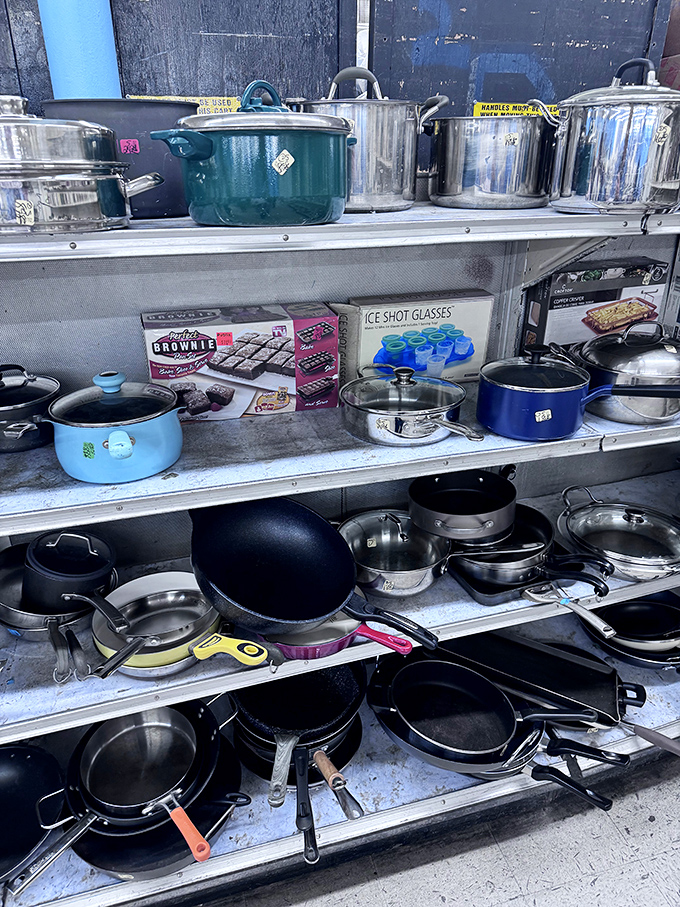 Cookware cornucopia where cast iron, non-stick, and stainless steel pans await home chefs who know good tools don't always need fancy packaging.