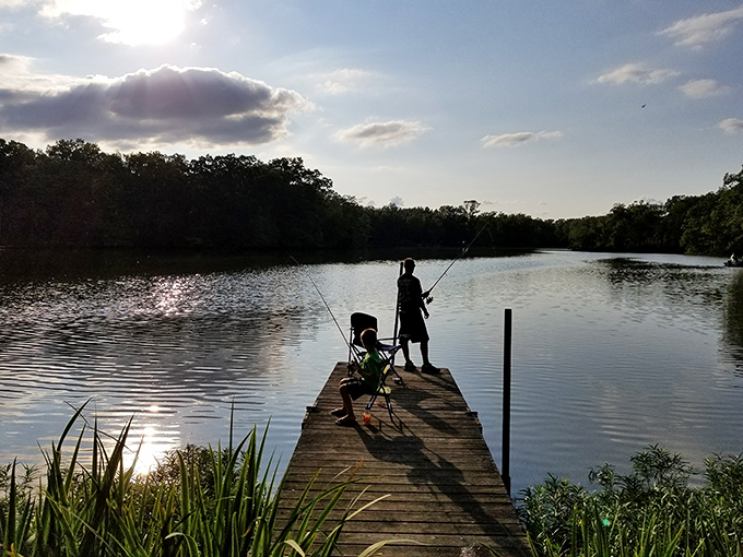 Fishing at golden hour &ndash; where patience isn't just a virtue, it's the entire business model. The silence is complimentary.