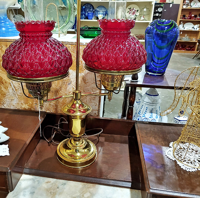 A vintage lamp that's seen the light of many decades. Those ruby-red shades would make Dorothy's slippers jealous.