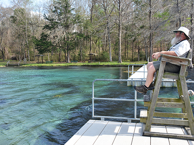 The best seat in the house! This lifeguard has the enviable job of watching over paradise all day long.