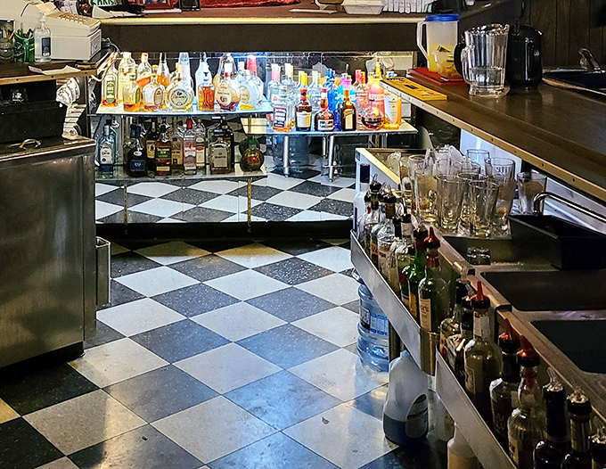 Behind every great sandwich joint is a well-stocked bar&mdash;this checkerboard floor has supported generations of satisfied patrons.