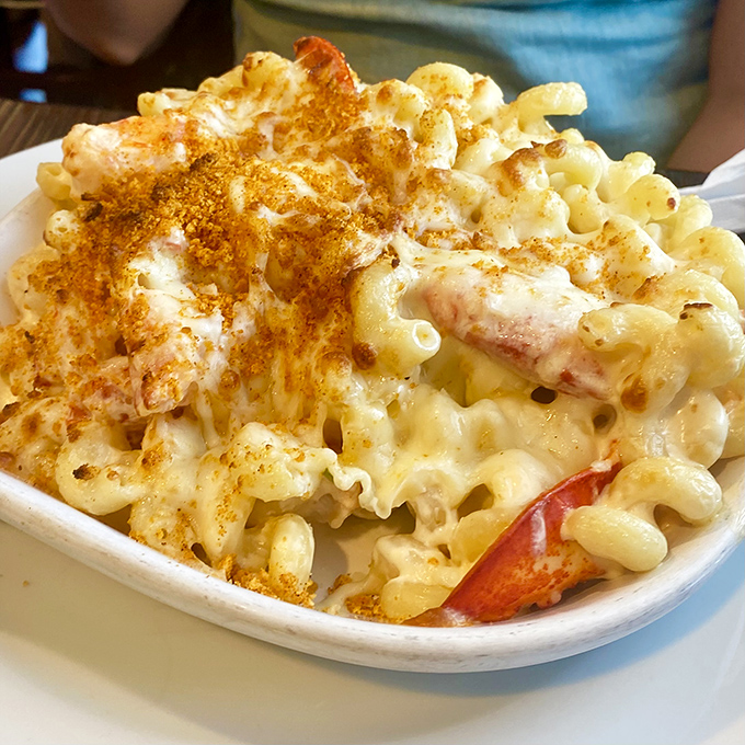 Lobster mac and cheese that makes ordinary comfort food hang its head in shame. That crispy top is basically the crown jewel of carbs.