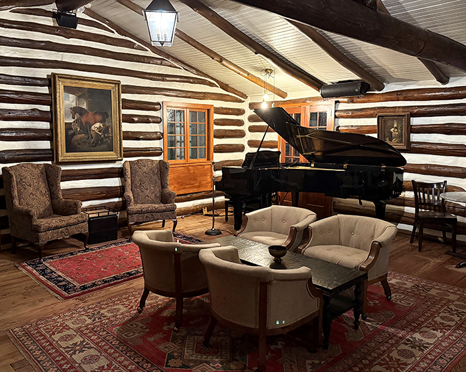 The piano waits patiently for evening melodies while comfortable seating invites pre-dinner drinks and post-meal lingering &ndash; resistance is futile.