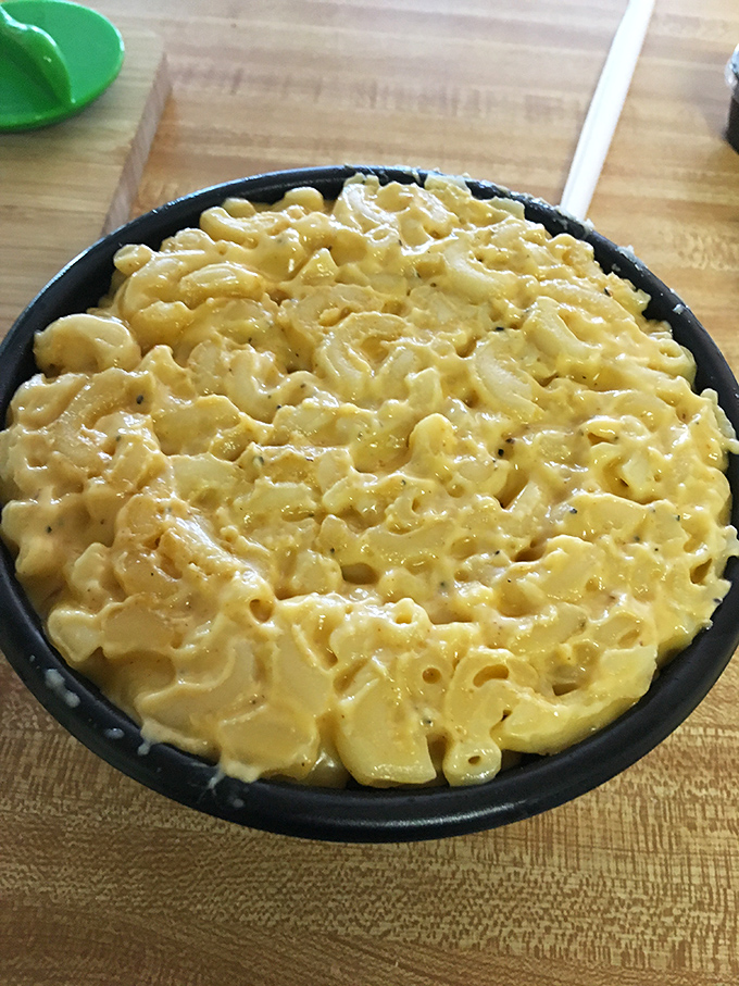 Mac and cheese so creamy it should be classified as a liquid asset. The kind of side dish that frequently gets promoted to main event.
