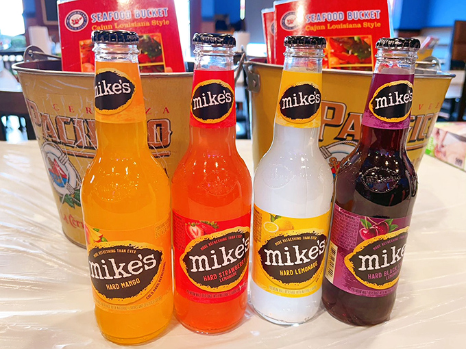 Mike's Hard beverages lined up like colorful soldiers ready for refreshment duty. Their fruity personalities stand up nicely to bold Cajun flavors.