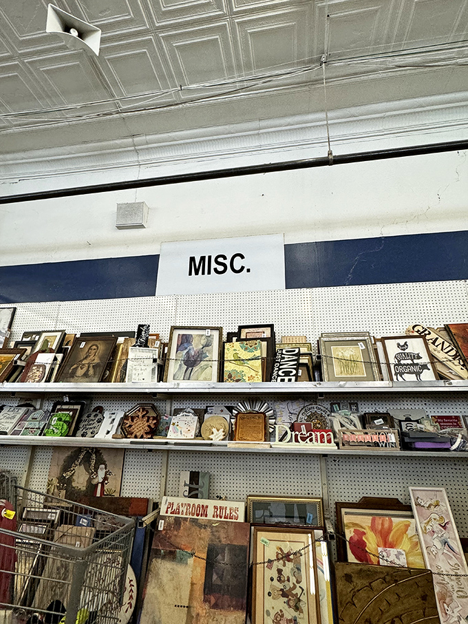 The "Misc." section&mdash;where forgotten artwork and inspirational signs create an accidental gallery of American domestic life.