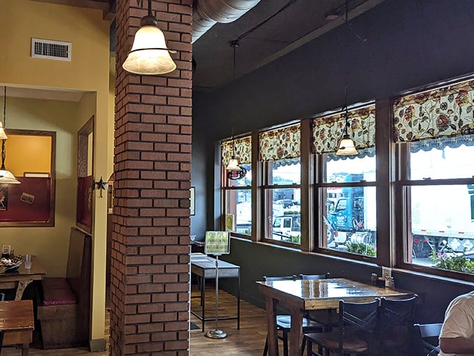 Exposed brick columns and large windows create that perfect balance of rustic charm and natural light&mdash;the ideal backdrop for food photography.