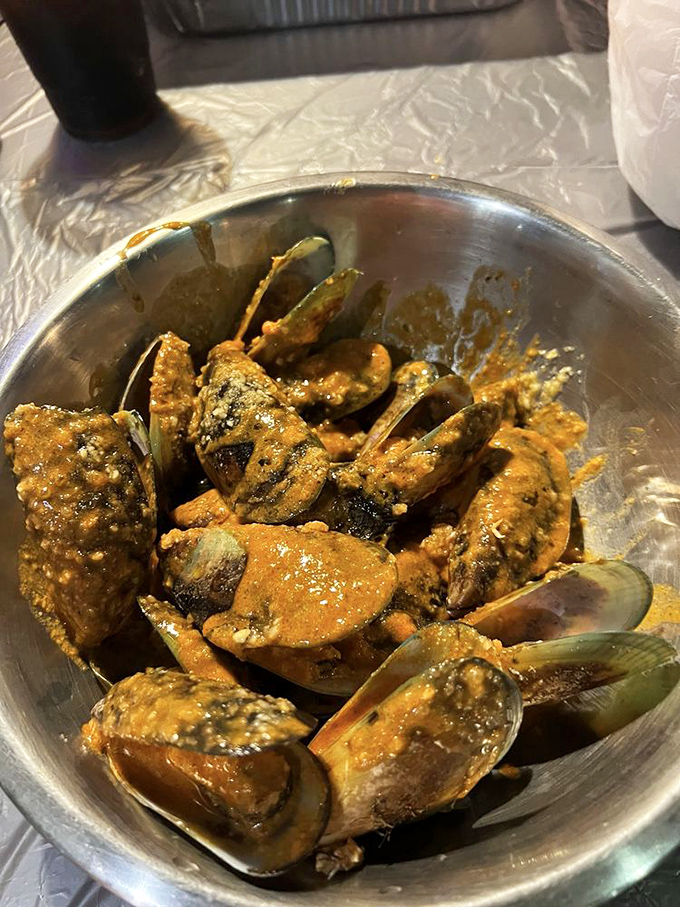 Mussels bathed in Cajun spices, opening up to reveal their secrets. These aren't just shellfish&mdash;they're little oceanic treasure chests of flavor.