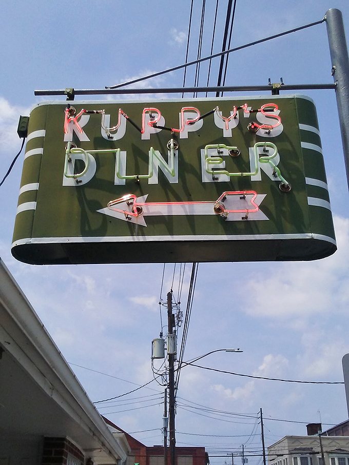 The vintage neon sign glows against the Pennsylvania sky like a beacon for hungry travelers&mdash;a promise of classic American comfort food that never goes out of style.