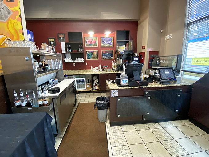 Where breakfast magic begins: the counter where orders transform into plates of morning joy.