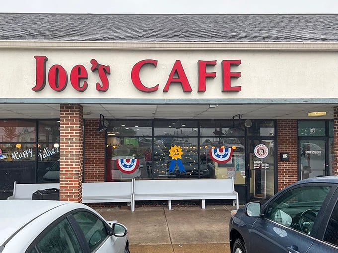 The storefront might be humble, but those red letters promise extraordinary flavors waiting just beyond the glass doors.
