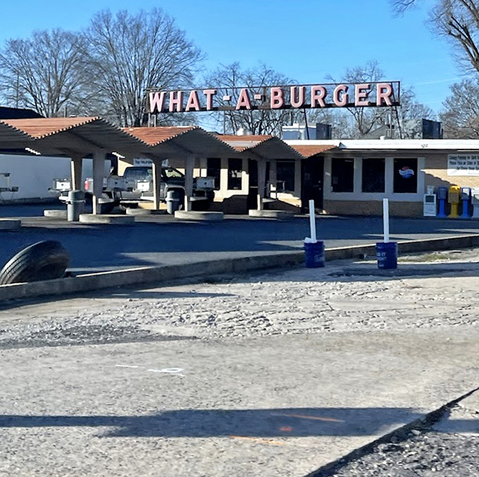 Winter can't dim the charm of this roadside classic. The "WHAT-A-BURGER" sign has guided hungry travelers through more seasons than a weather almanac.