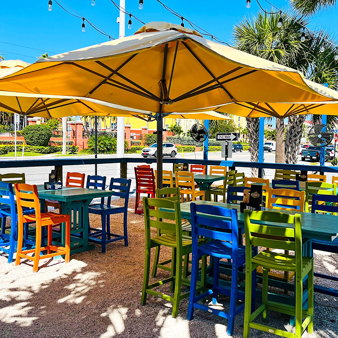Outdoor seating in a rainbow of chairs that's more cheerful than a beach umbrella convention. Florida dining as it should be&mdash;colorful and sun-kissed.