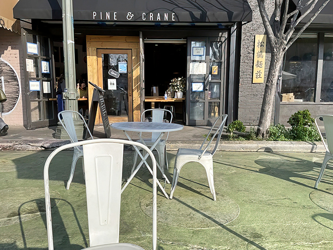Outdoor seating at Pine & Crane: where Silver Lake sunshine meets Taiwanese flavors. These metal chairs have witnessed countless first bites and wide-eyed "wow" reactions.
