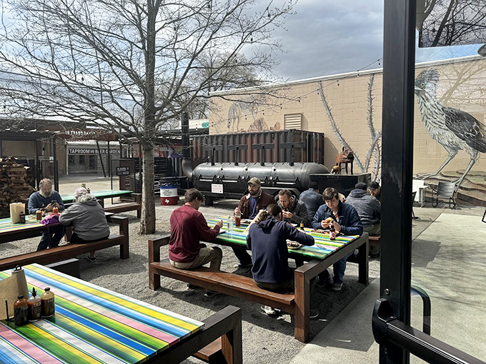 Outdoor dining with a view of the smokers&mdash;barbecue theater at its finest. Those picnic tables have witnessed countless moments of meat-induced joy.
