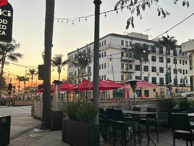 As the sun sets over Ventura, MidiCi's outdoor seating becomes prime real estate for pizza enthusiasts and sunset chasers alike.