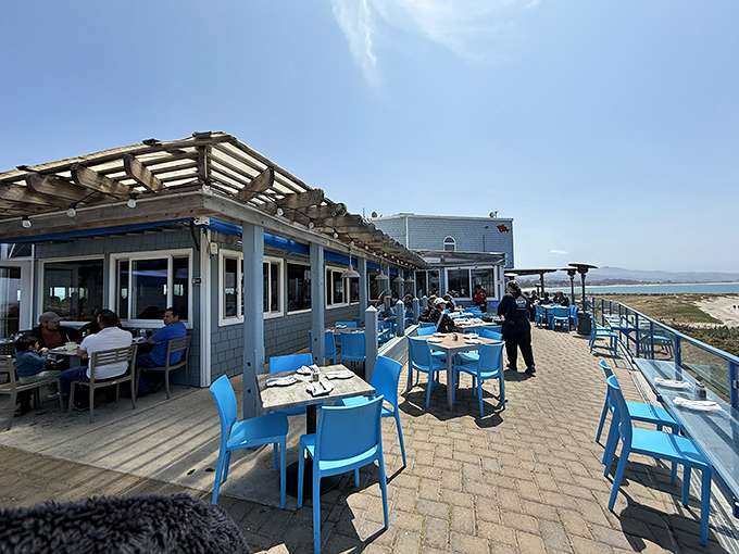 Blue chairs against blue ocean against blue sky&mdash;a color coordination that reminds you some dining experiences are worth traveling for.