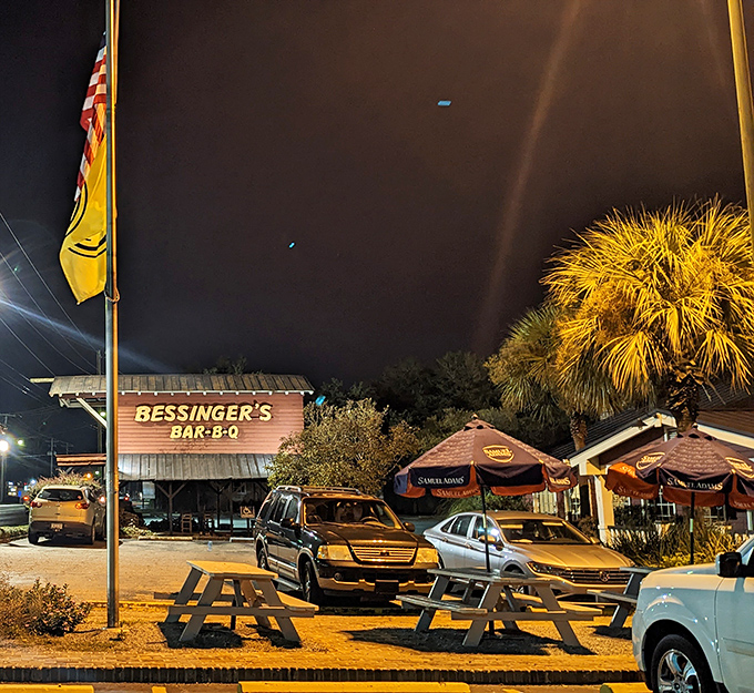As night falls, the glow of Bessinger's sign becomes a barbecue lighthouse, guiding hungry souls to smoky salvation even after the sun goes down.