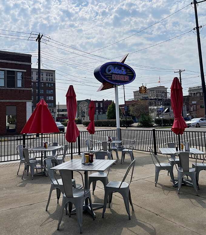 Outdoor dining under Massillon skies, where red umbrellas stand at attention, ready to shield you from everything except good conversation.