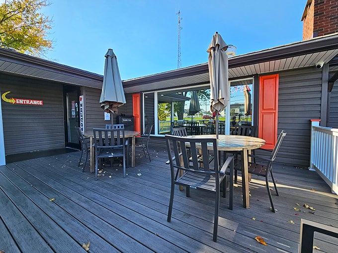 The outdoor patio offers al fresco hot dog enjoyment, where summer breezes complement the snap of that first delicious bite.